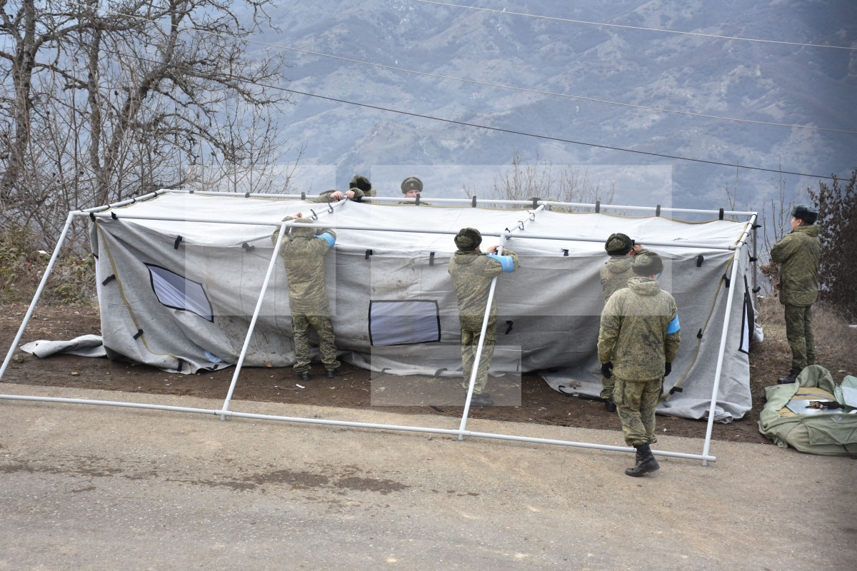 Russian peacekeepers install modular barracks, tents and generators in ...